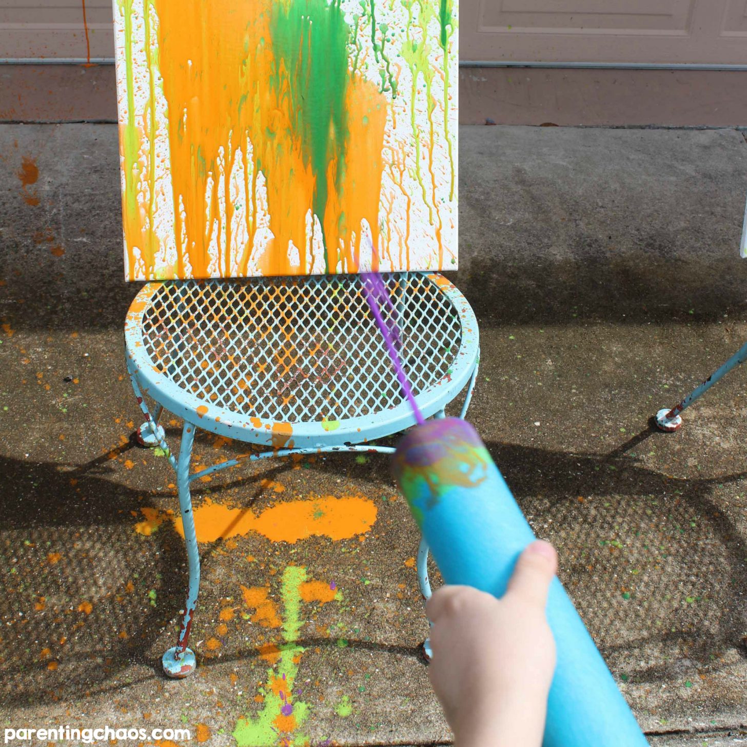 Water Gun Squirt Painting - Outdoor Process Art Fun! ⋆ Parenting Chaos